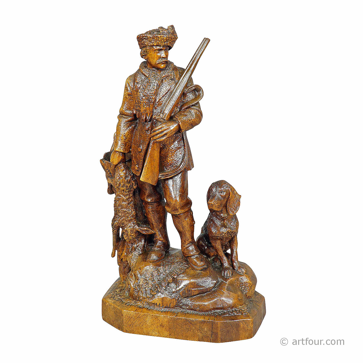 A carved statue of a hunter by Johann Huggler, Brienz ca. 1900