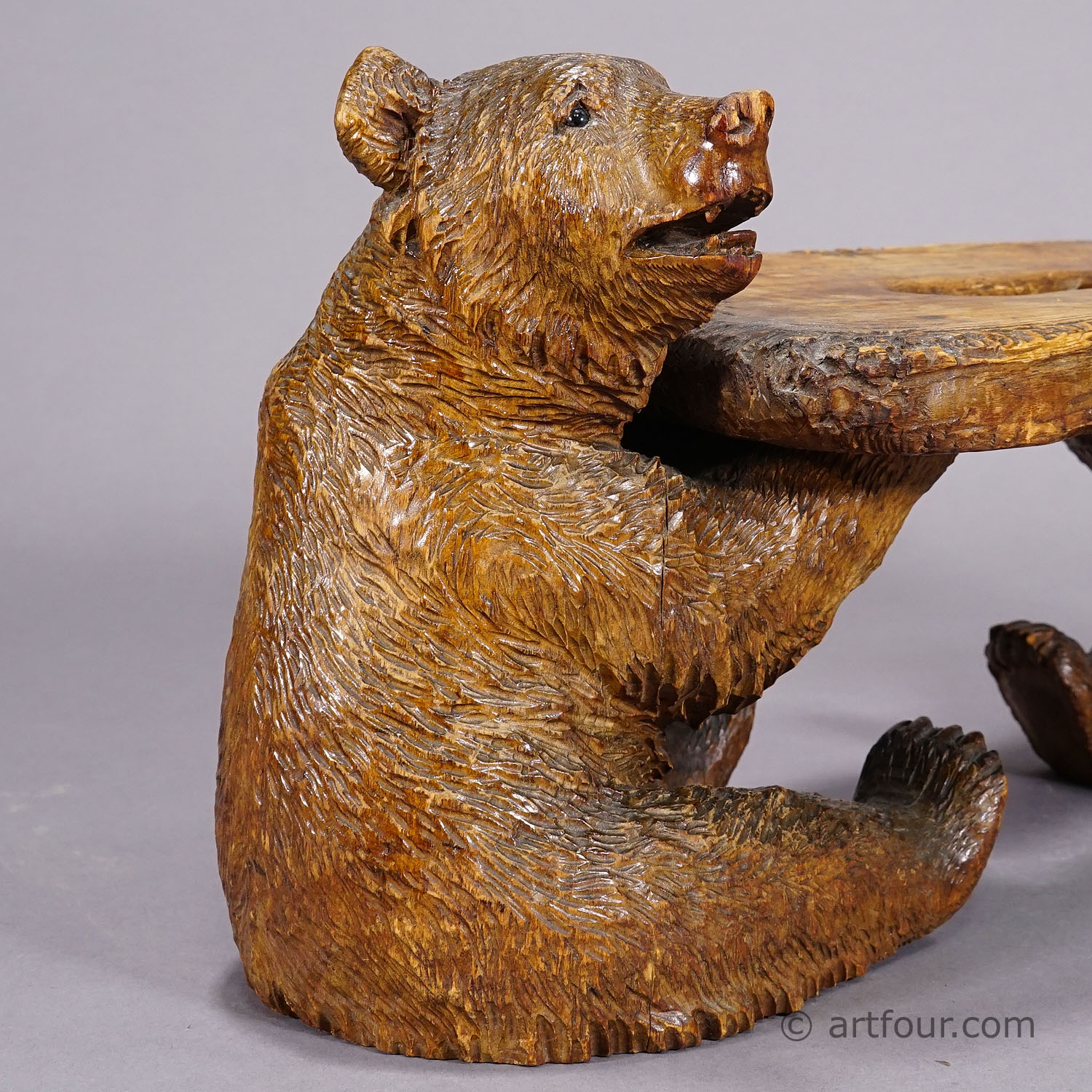 A wooden carved Black Forest bear bench, ca. 1900s