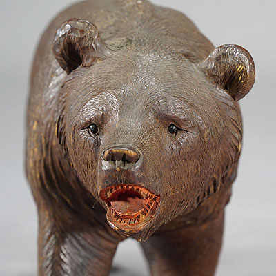 a whimsy carved wooden strolling bear | artfour.com